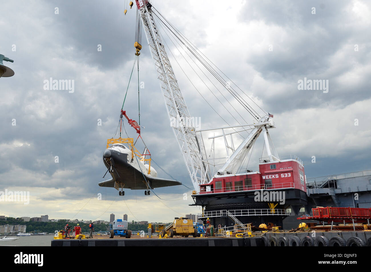 The NASA space shuttle prototype Enterprise waits to be hoisted by ...
