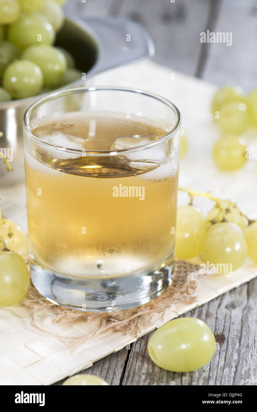 Grape Juice in a glass with fresh fruits Stock Photo - Alamy