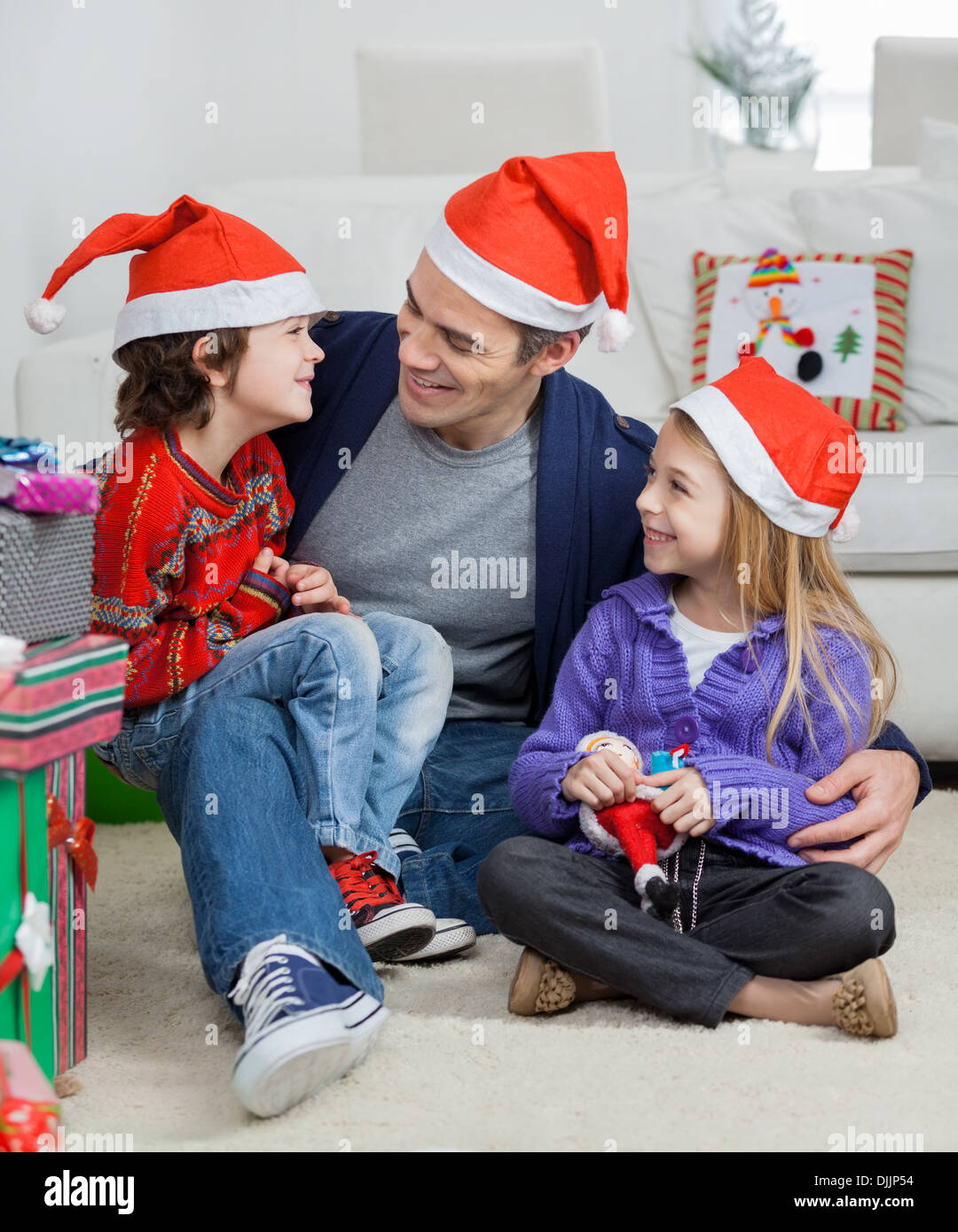Happy family during christmas hi-res stock photography and images - Alamy