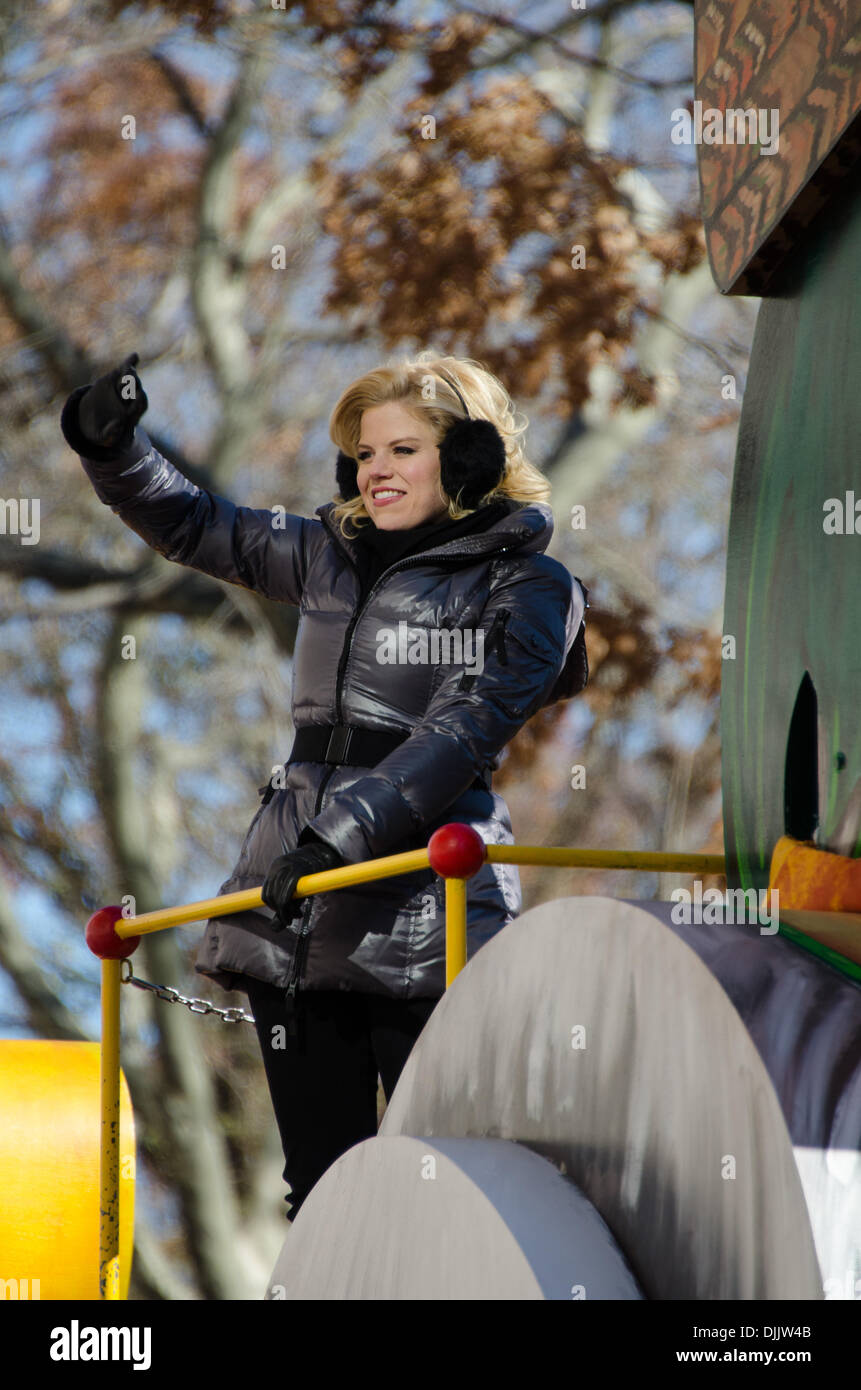 NEW YORK, NY, USA, Nov. 28, 2013. Megan Hilty waves from a float in the ...