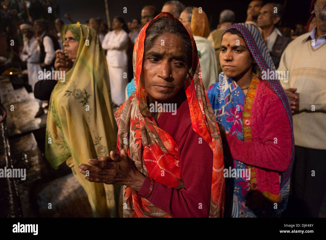 A group of believers pray during the ceremony that every night is ...
