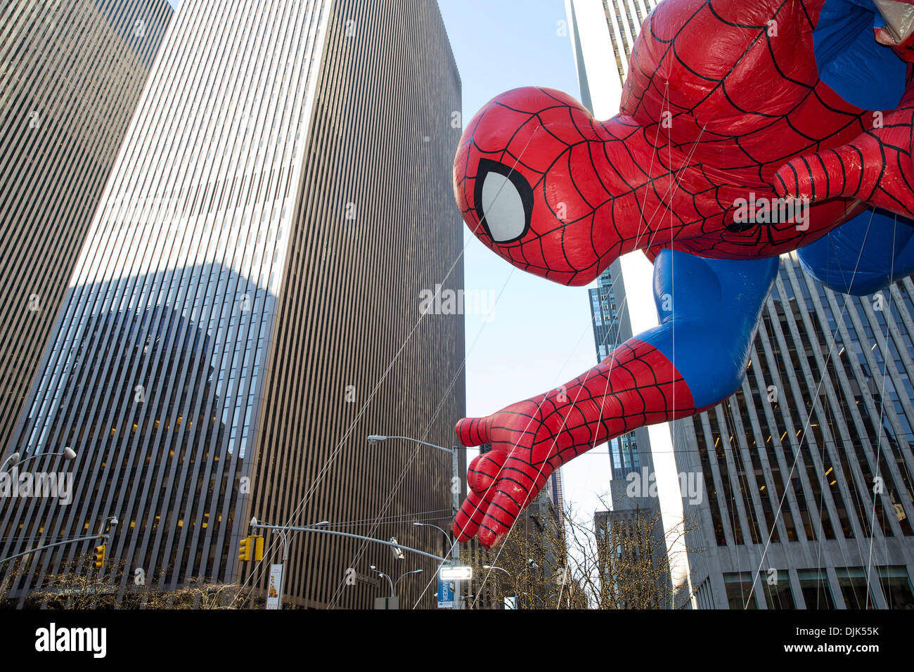 New York, USA. 28th November 2013. The Spiderman balloon floats above ...