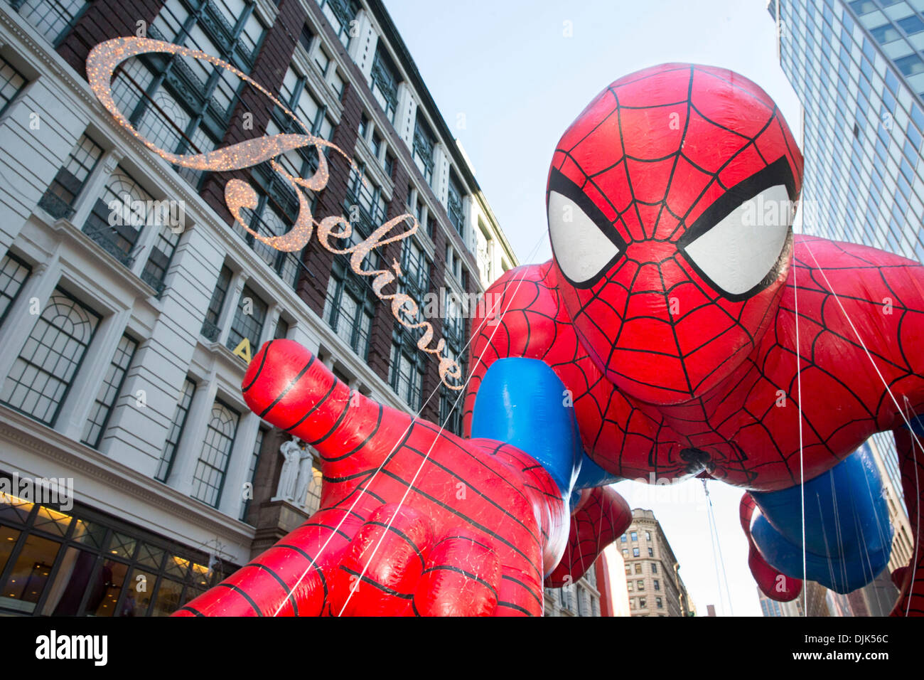 New York, USA. 28th November 2013. The Spiderman balloon floats above ...