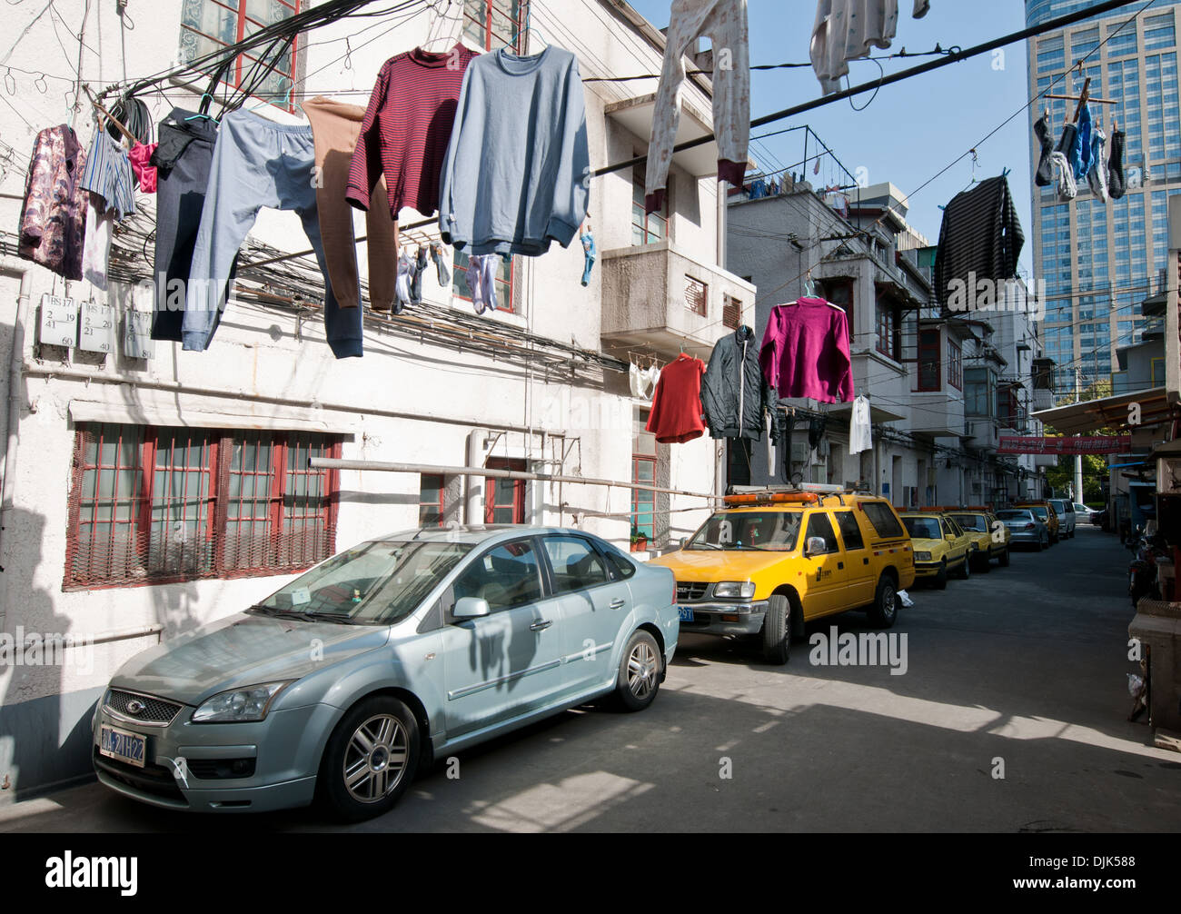 Laundry on clothesline on street in Old Town (Nanshi), Shanghai, China ...
