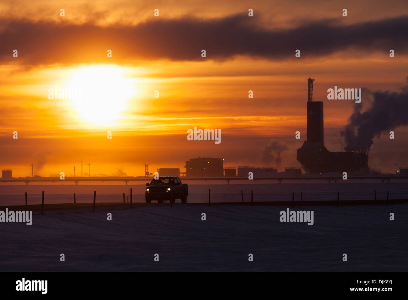 Pickup Truck Driving Down The Road With Parker Drilling Rig 273 In The ...