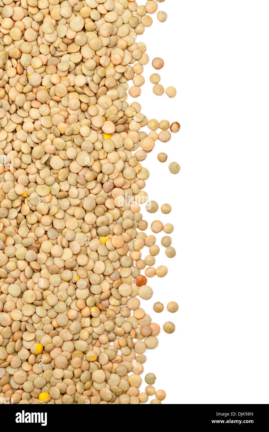 Raw uncooked lentils border on white background Stock Photo - Alamy