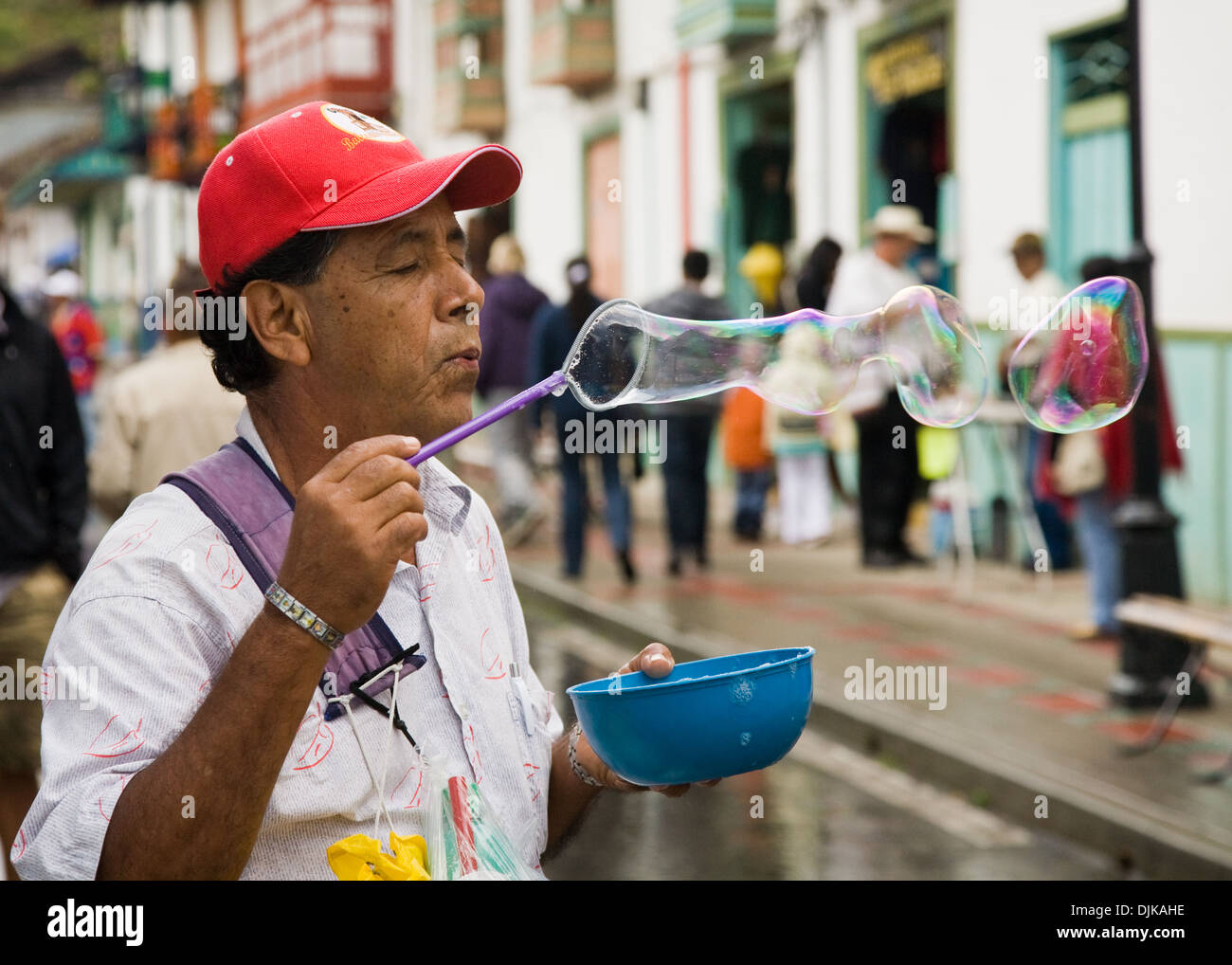 Man blowing bubbles, Salento, Colombia Stock Photo - Alamy