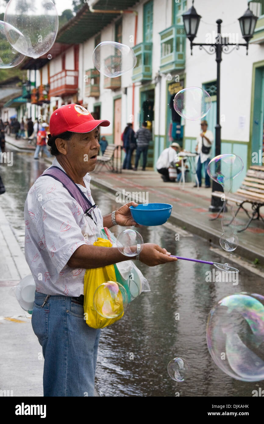 Man blowing bubbles, Salento, Colombia Stock Photo - Alamy
