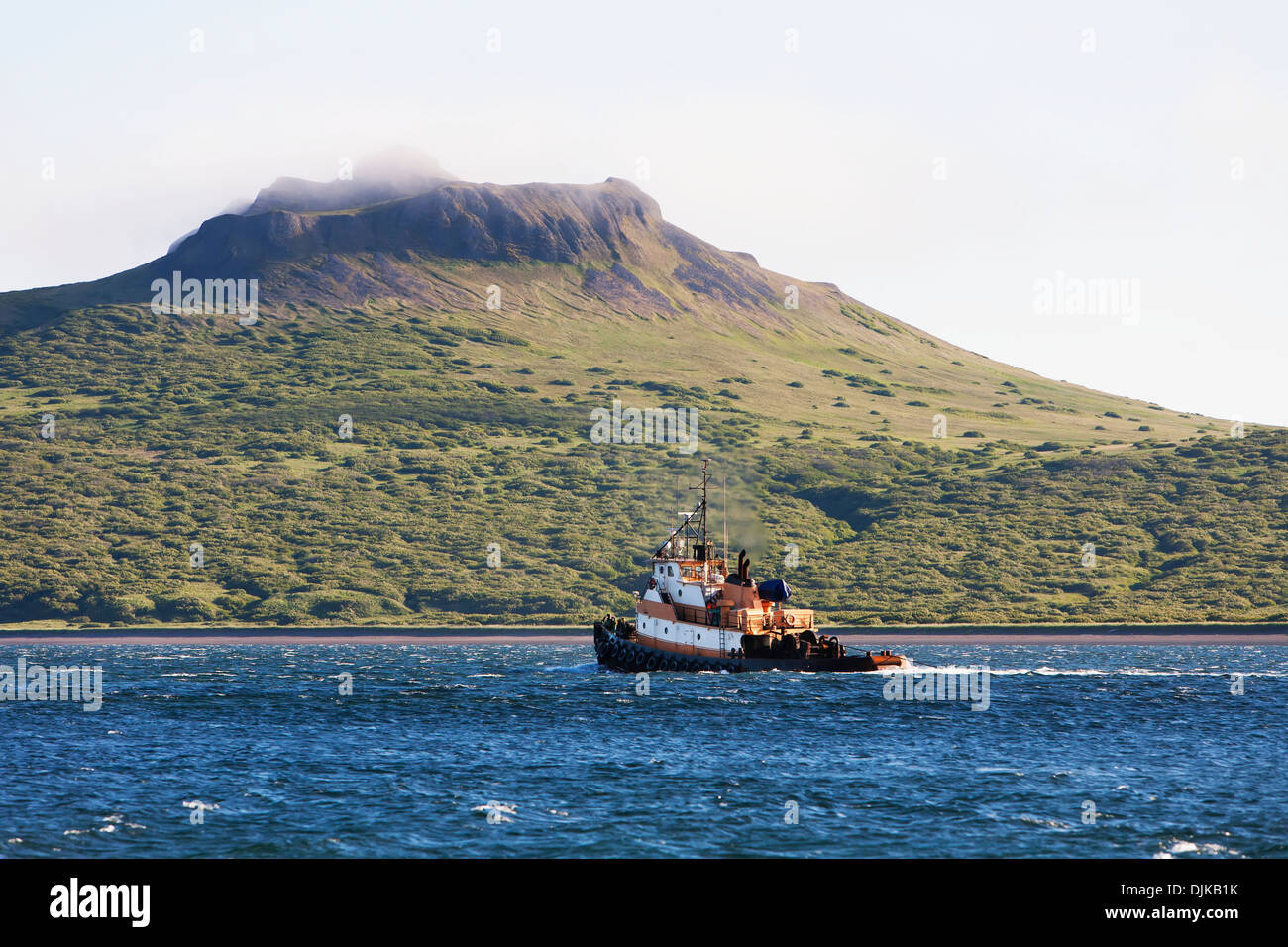 A Tug And Barge Heading Through Isanotski Strait, False Pass, Alaska ...