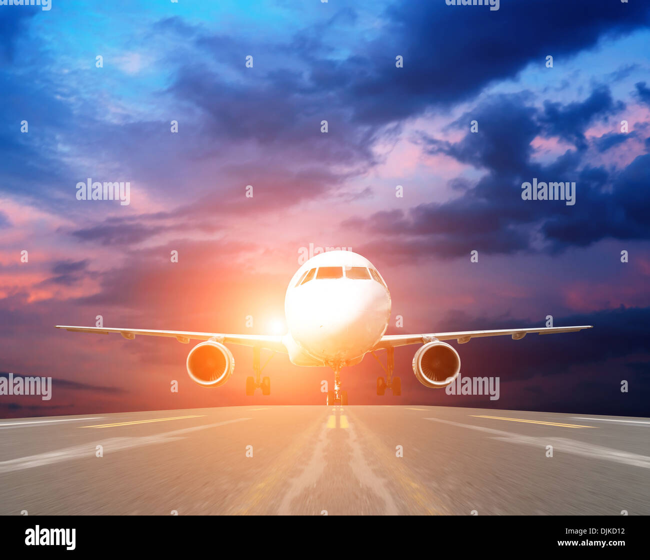airplane at takeoff seen from the bottom in the airport landing strip ...