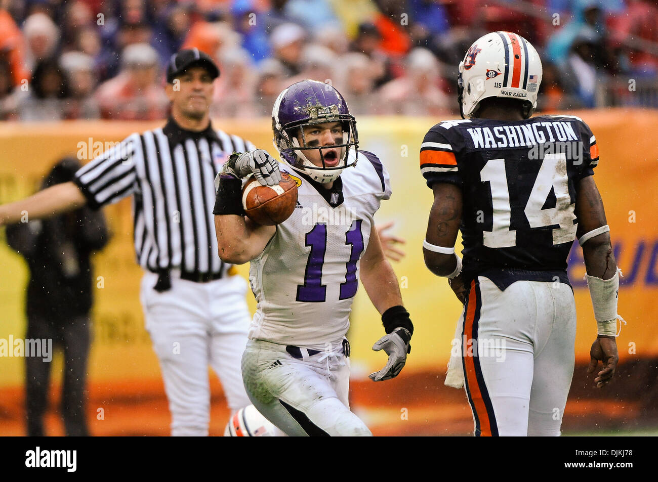 11 Northwestern Wide Receiver Jeremy Ebert celebrates after picking up ...