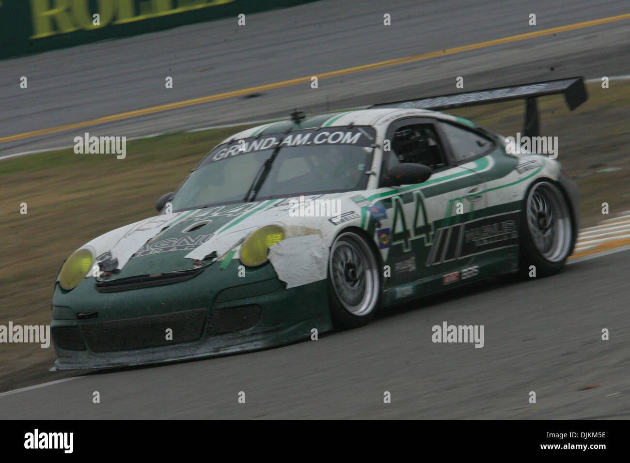 The No. 44 Porsche GT3 Cup races through the infield section during the ...