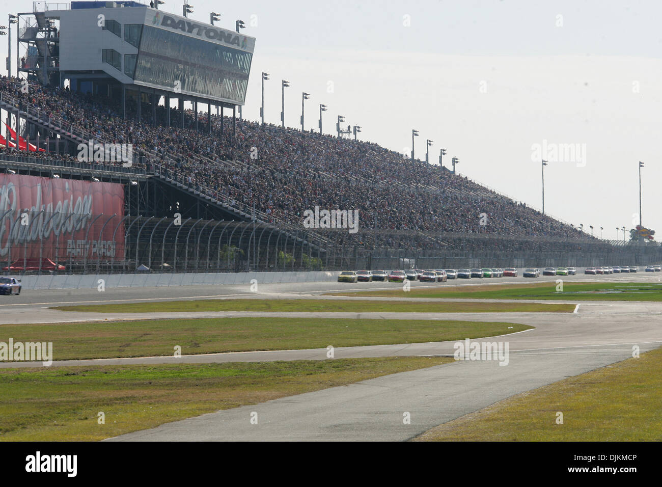 The field roars down the superstretch at Daytona International Speedway ...