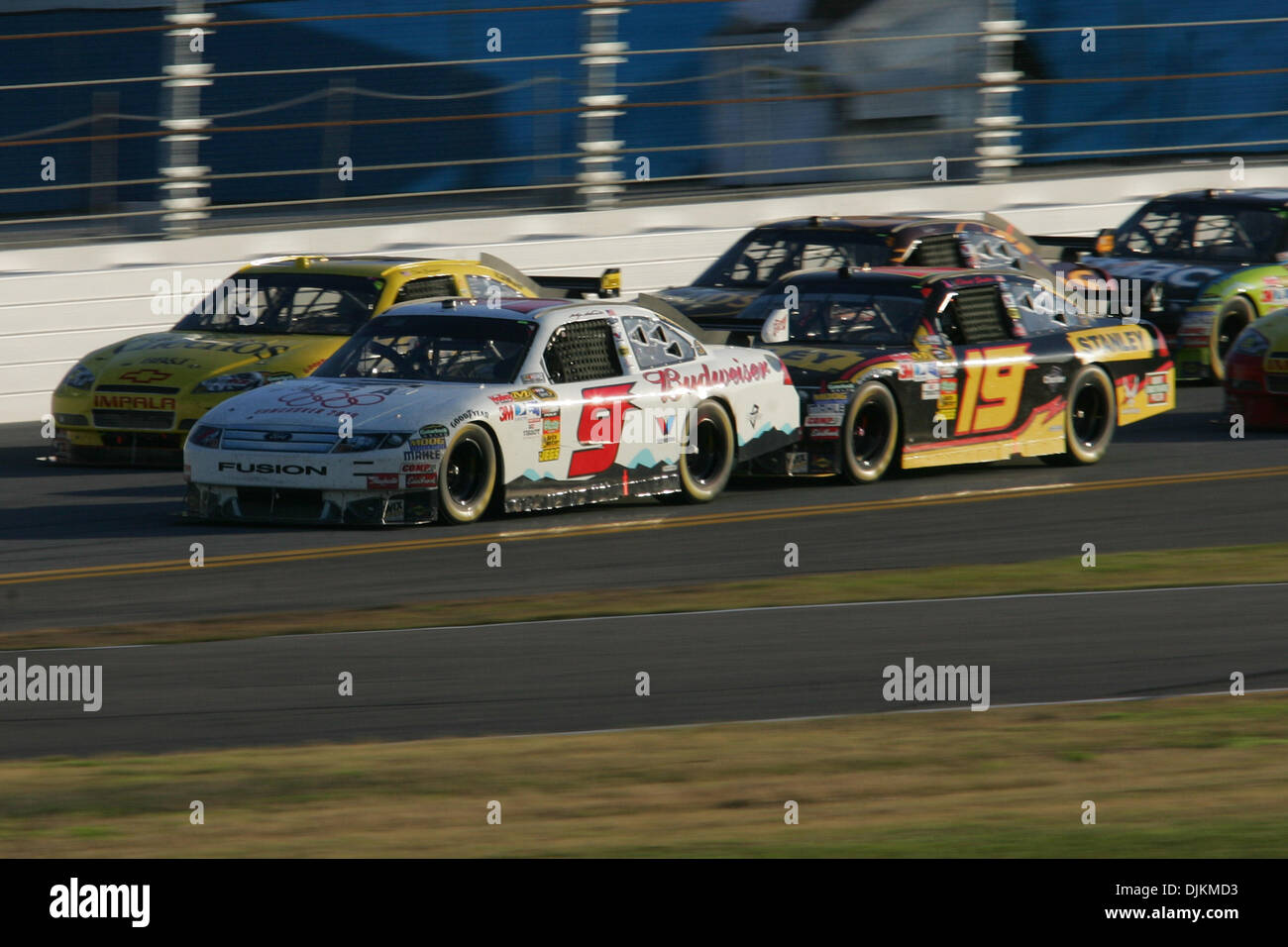 Elliott Sadler (19) gives Kasey Kahne (9) a push during the Daytona 500 ...