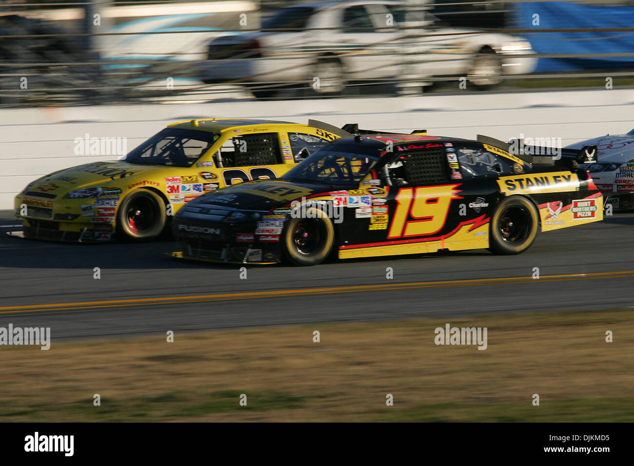 Elliott Sadler (19) and Clint Bowyer (33) race during the Daytona 500 ...