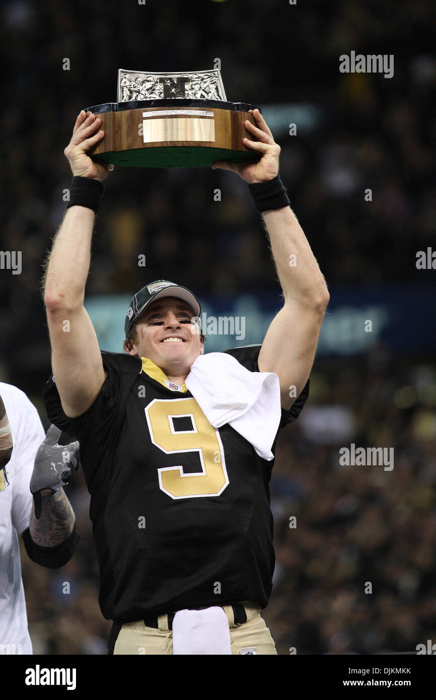 24 January 2010: Saints quarterback Drew Brees (9) holds up the NFC ...