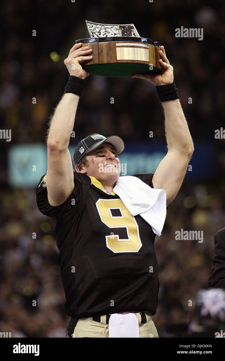 24 January 2010: Saints quarterback Drew Brees (9) holds up the NFC ...