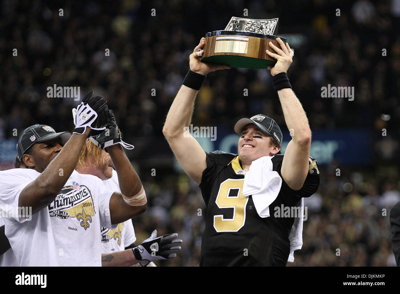 24 January 2010: Saints quarterback Drew Brees (9) holds up the NFC ...
