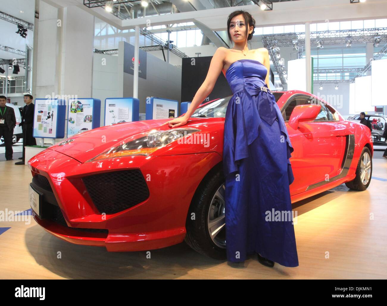 Beijing, CHINA, China. 23rd April, 2010. A Chinese model poses next to ...