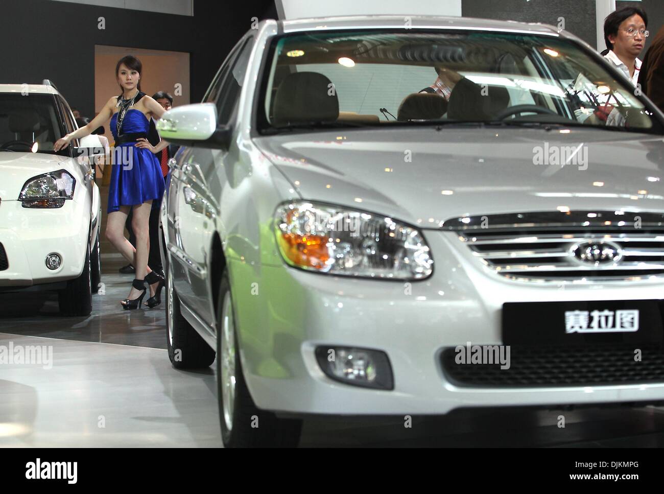 Beijing, CHINA, China. 23rd April, 2010. Chinese models pose next to ...
