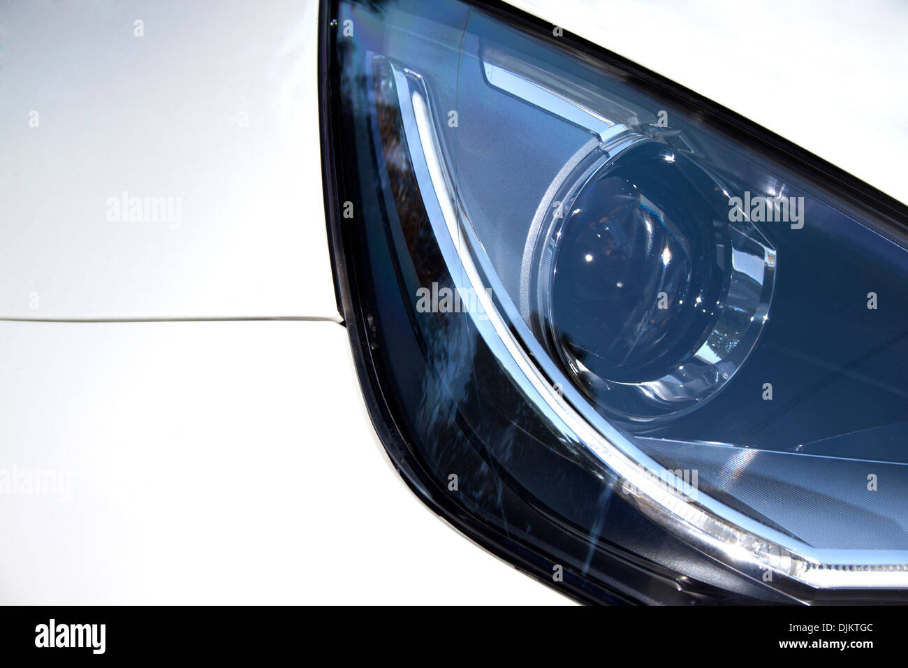 extreme abstract close up of vehicles left front headlamp with copy ...