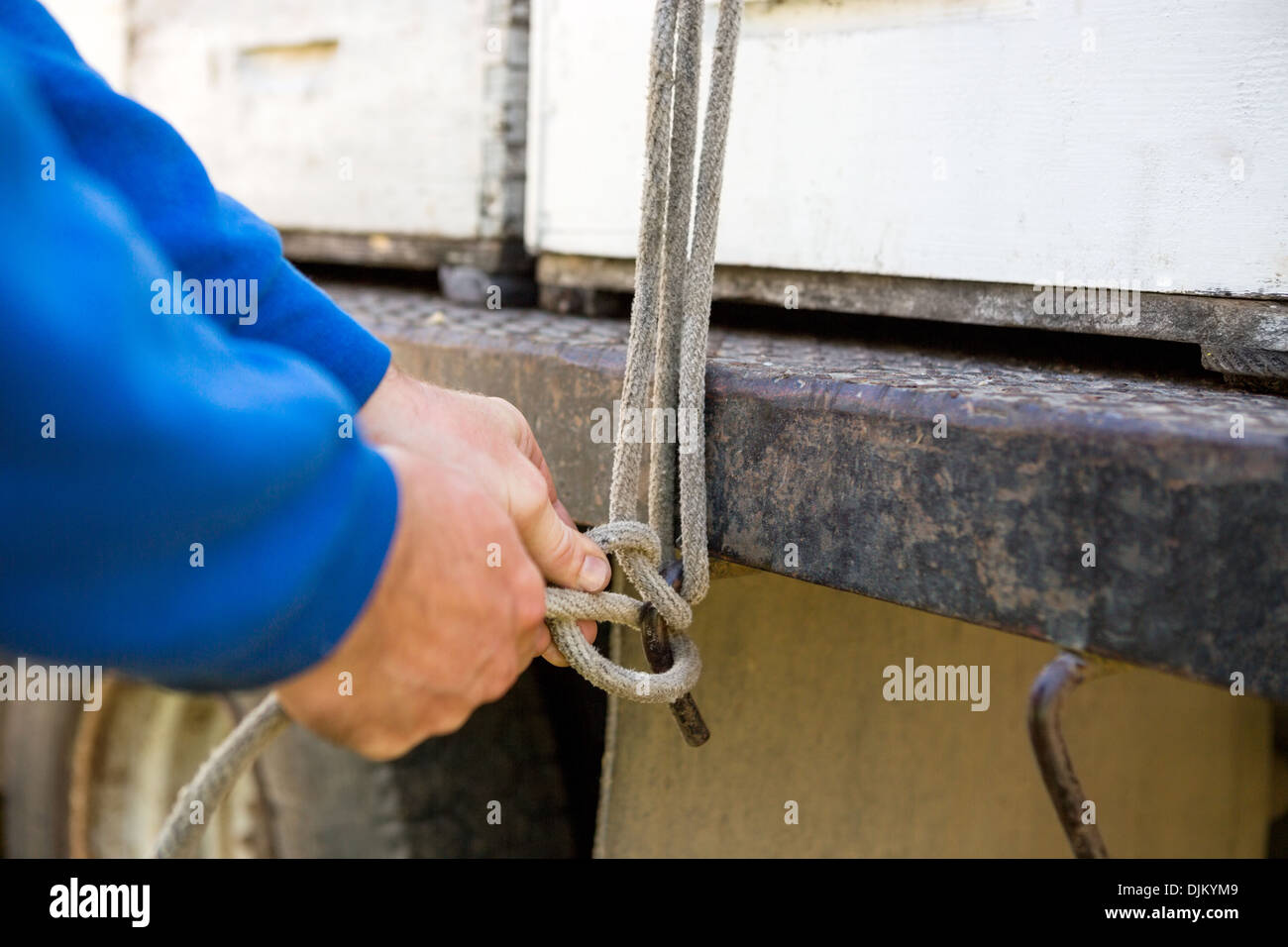 Tying rope hi-res stock photography and images - Alamy