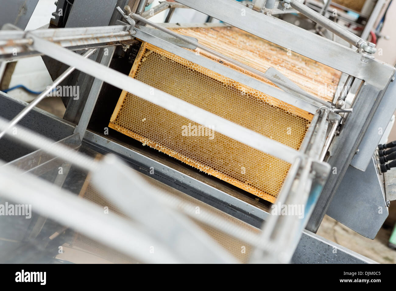 Frames honey in extractor hi-res stock photography and images - Alamy