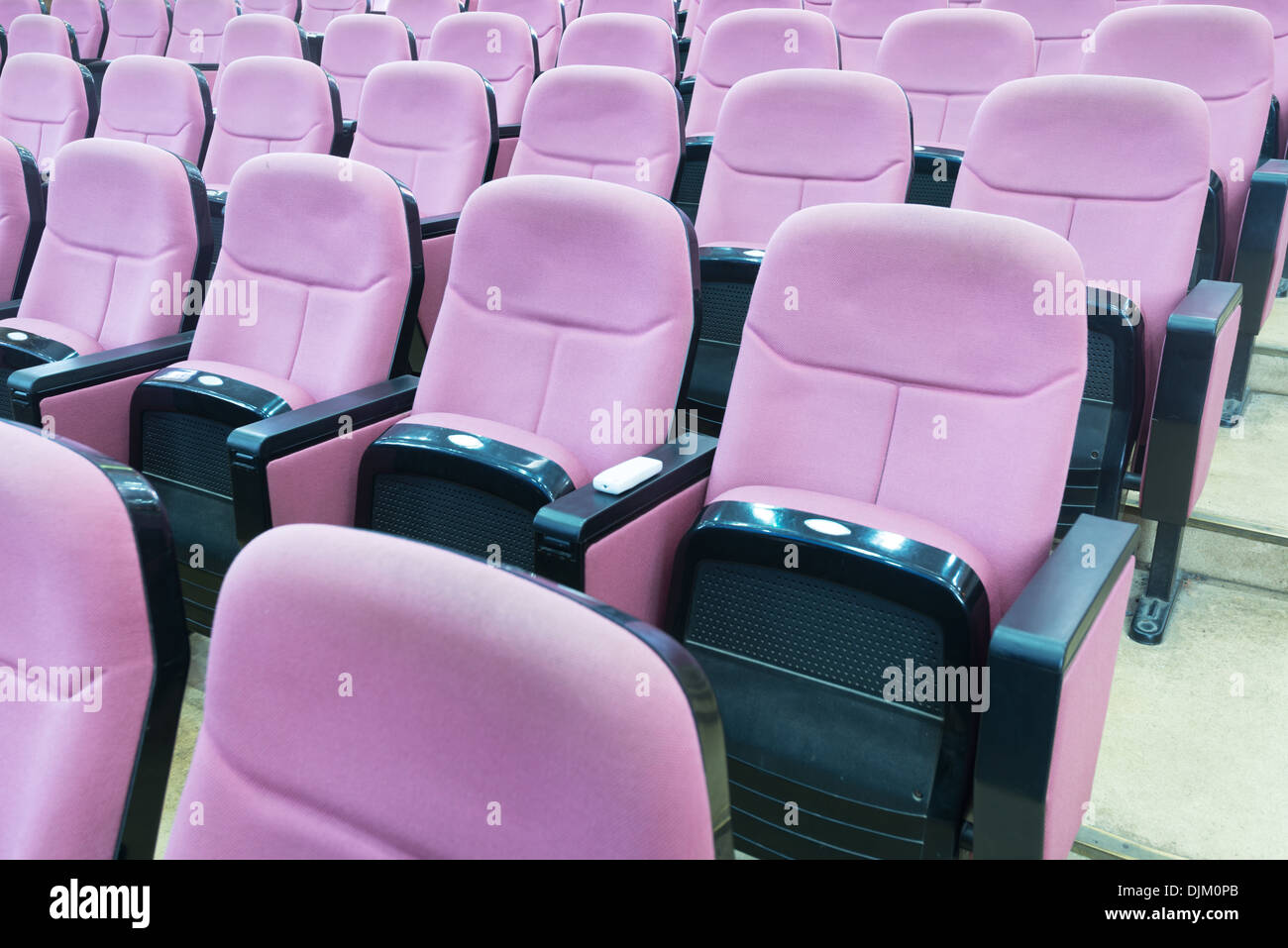 Empty hall for presentation with armchairs Stock Photo - Alamy