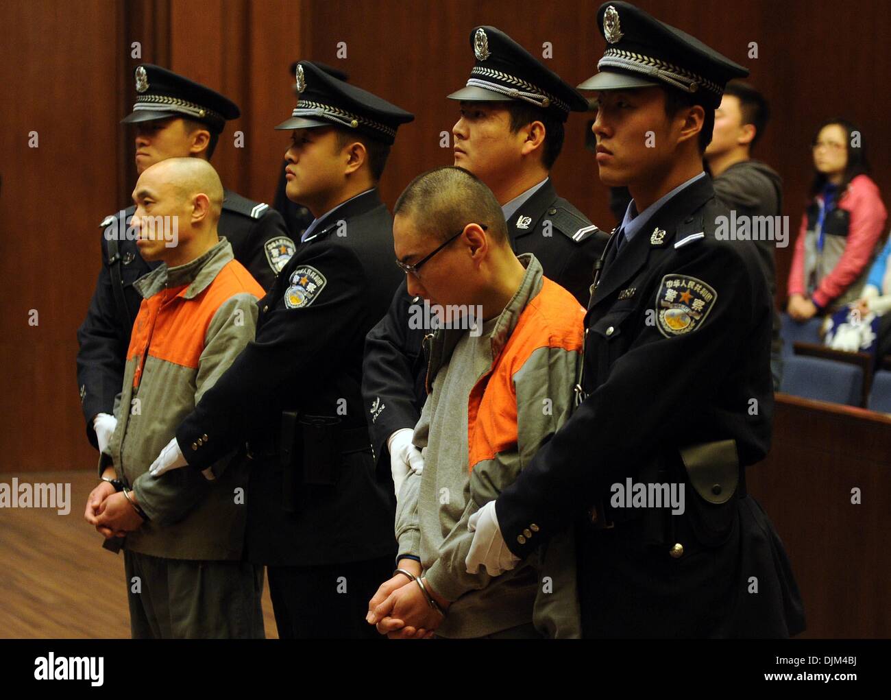 Beijing, China. 29th Nov, 2013. Han Lei (R, front), a baby killer, and ...