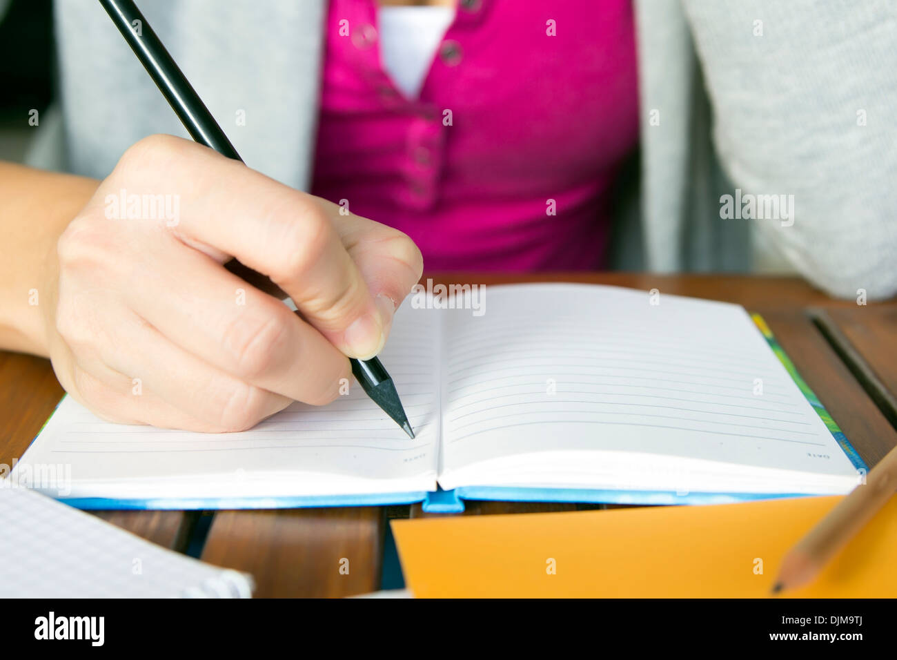 Writing hand jotting notes hi-res stock photography and images - Alamy