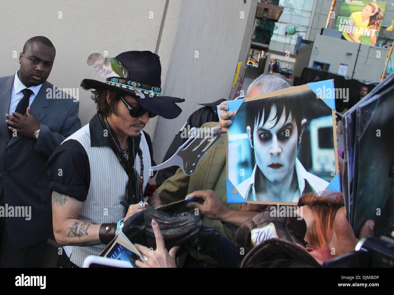 Actor Johnny Depp sign autographs outside El Capitan Theatre for 'Jimmy ...