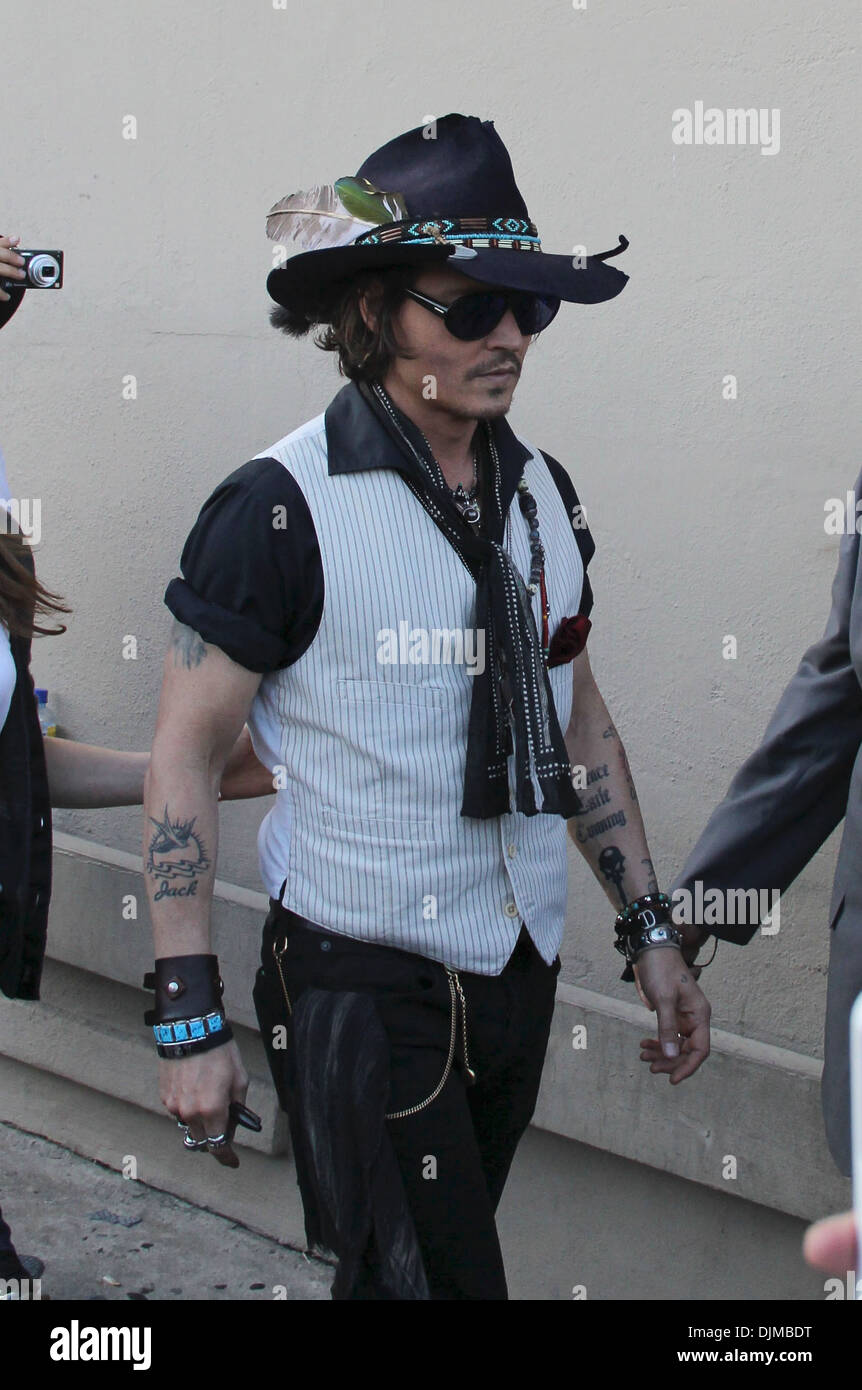 Actor Johnny Depp sign autographs outside El Capitan Theatre for 'Jimmy ...