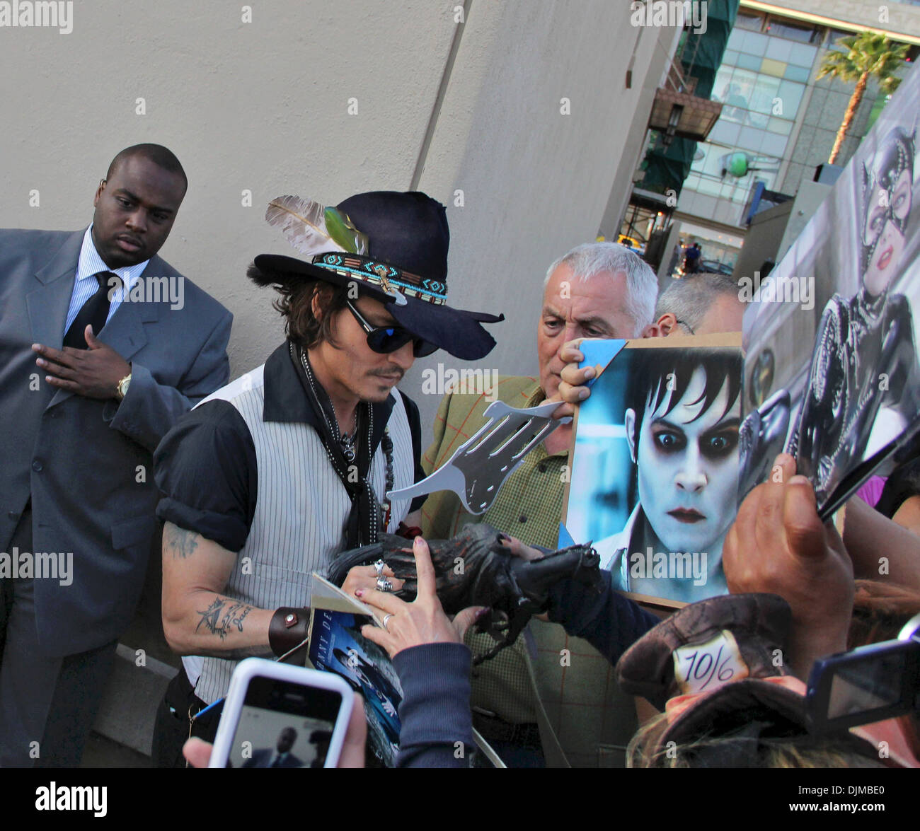 Actor Johnny Depp sign autographs outside El Capitan Theatre for 'Jimmy ...