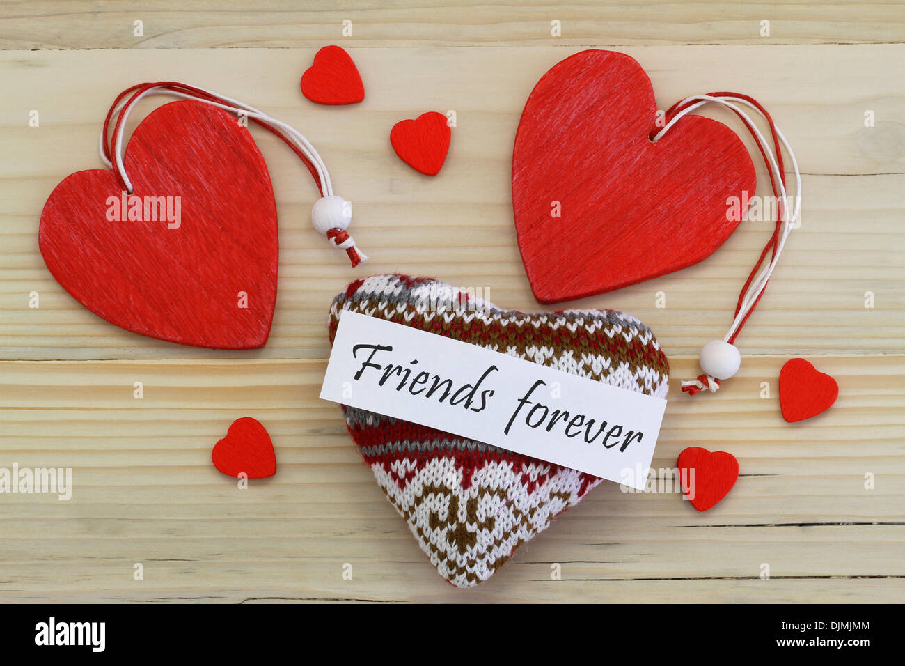 Friends forever card with wooden and knitted hearts Stock Photo - Alamy