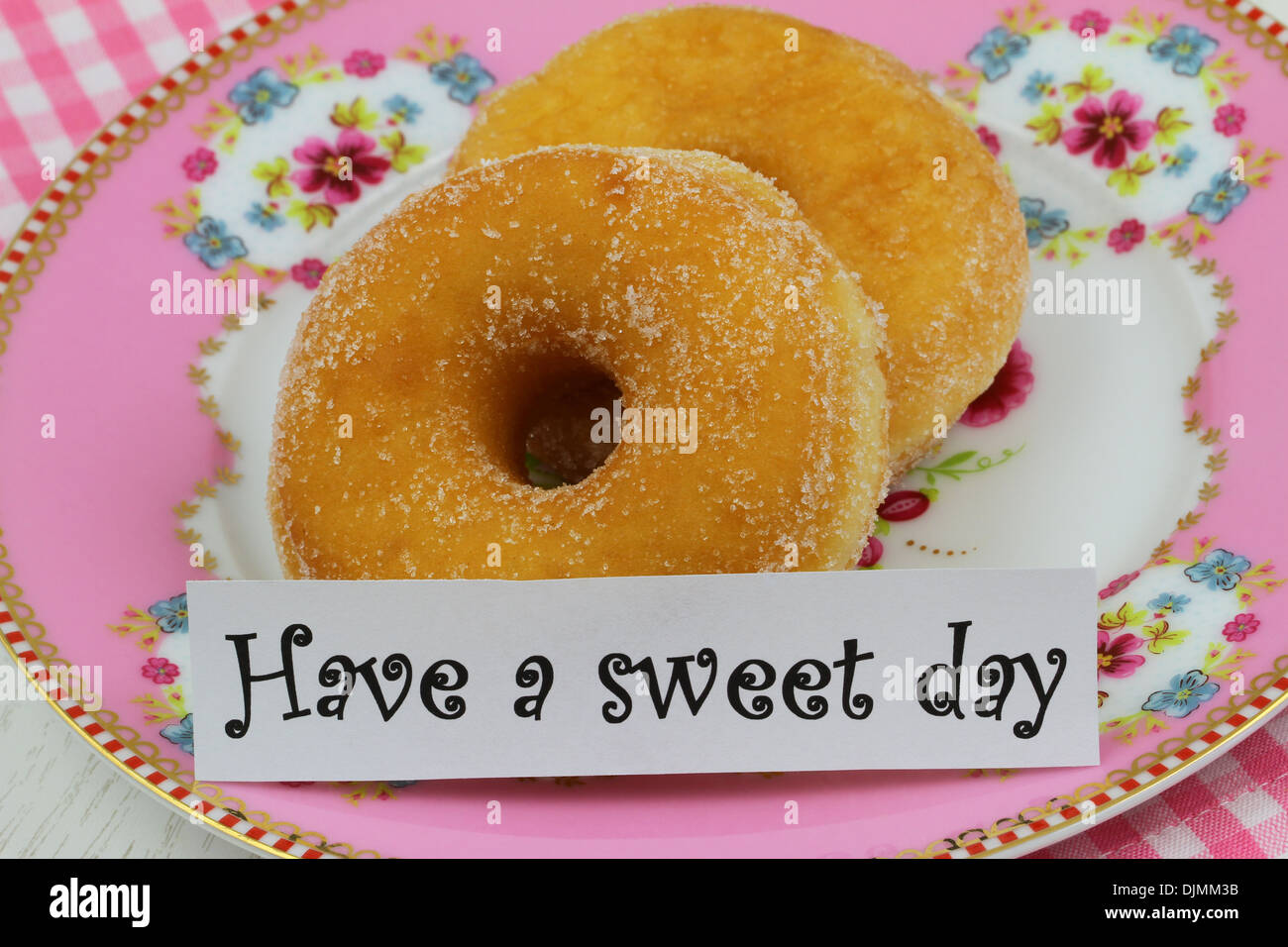 Have a sweet day card with ring doughnuts Stock Photo - Alamy