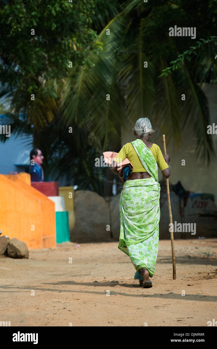 Woman in saree walking hi-res stock photography and images - Alamy