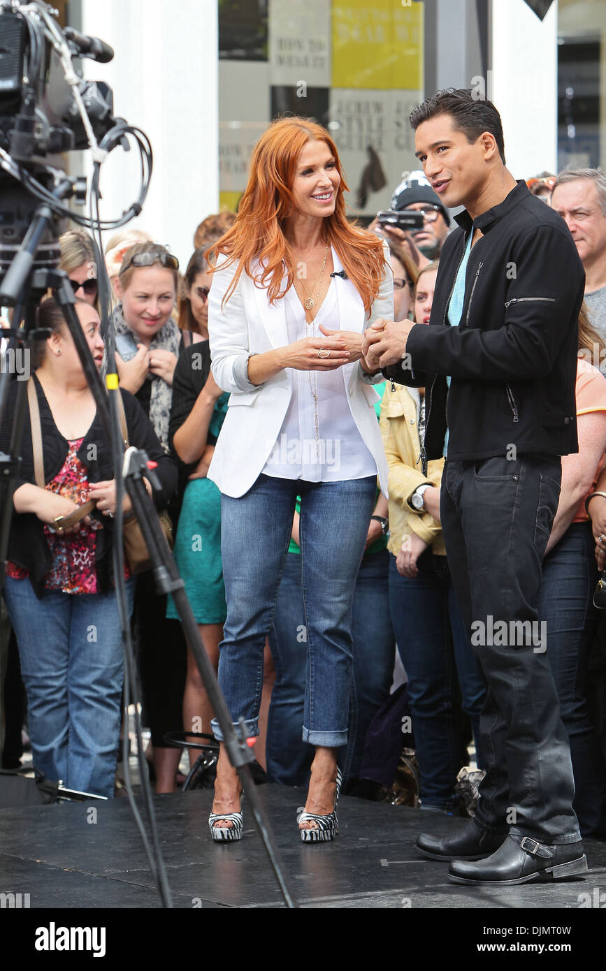 Poppy Montgomery and Mario Lopez appear on entertainment news show ...