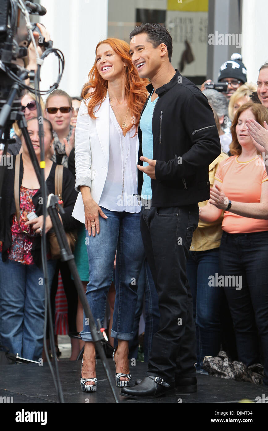 Poppy Montgomery and Mario Lopez appear on entertainment news show ...