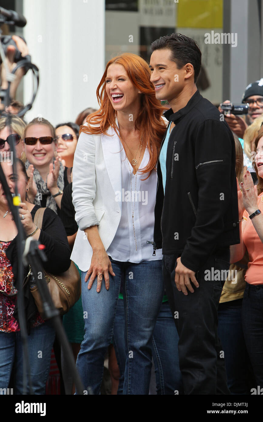 Poppy Montgomery and Mario Lopez appear on entertainment news show ...