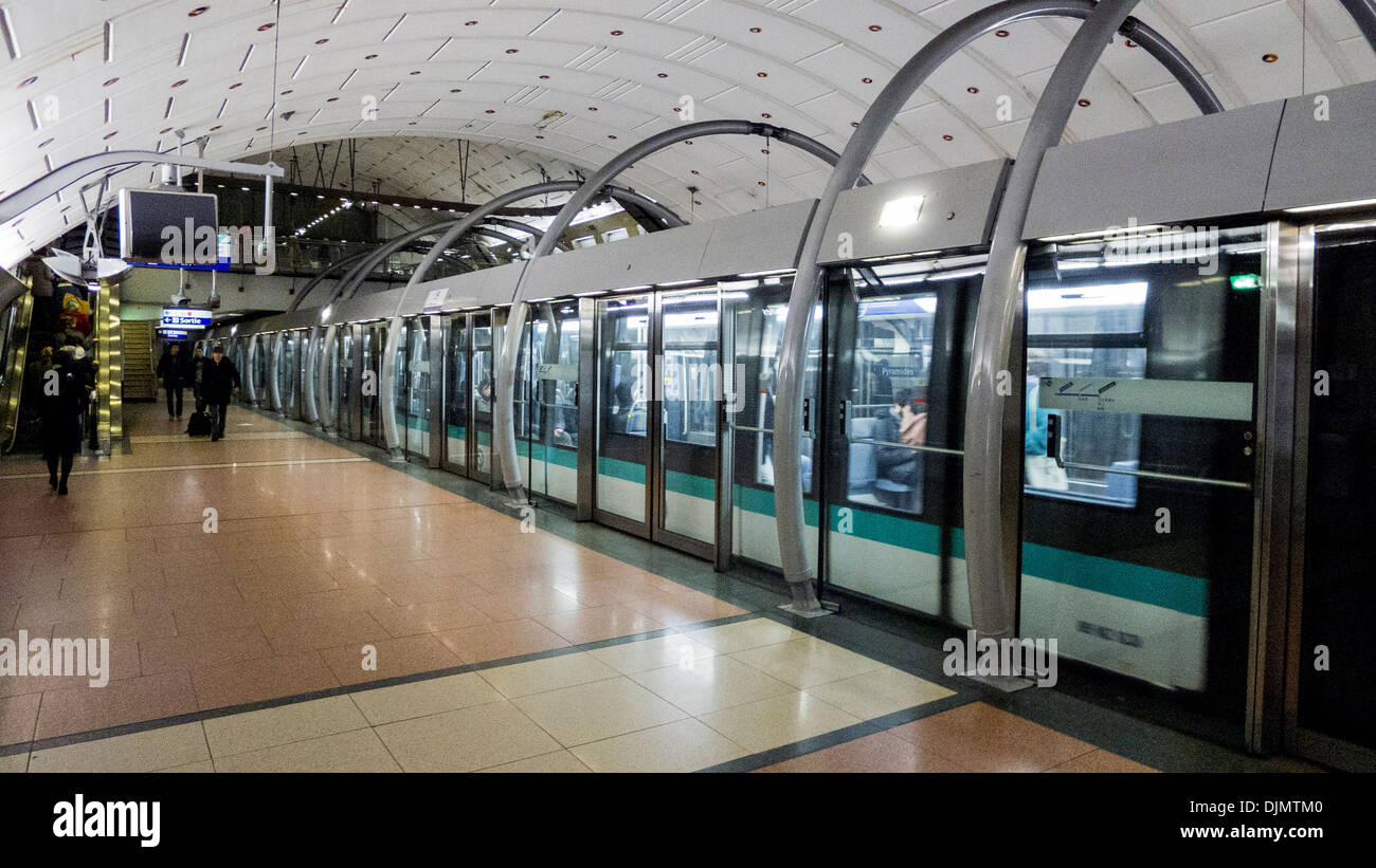 Modern part of the Paris Metro system with walls separating the ...