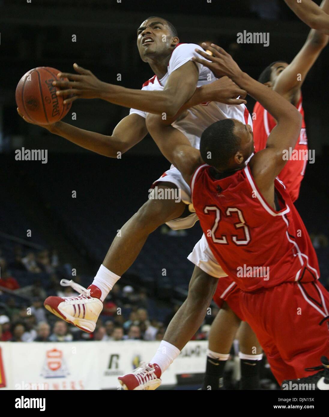 St. Mary's Chris Brew goes to the hoop over John F. Kennedy's Jonathon ...