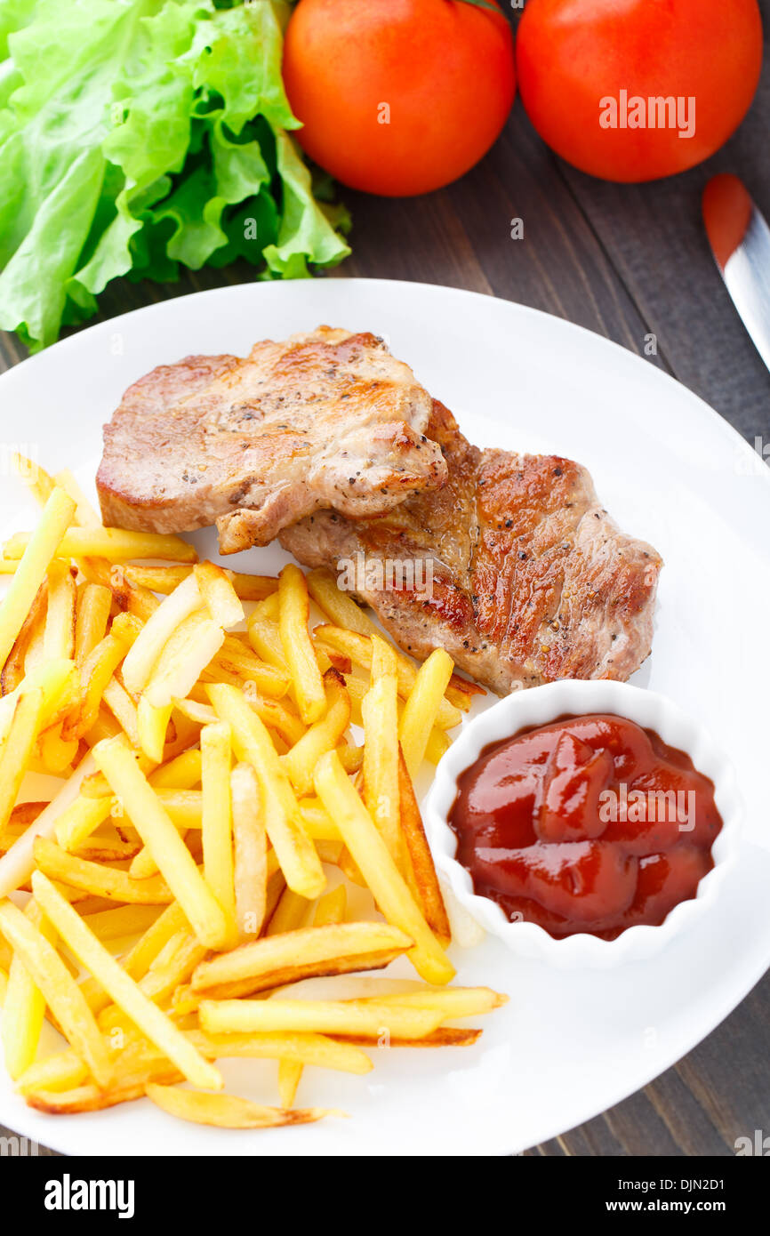 Fried steak with french fries Stock Photo - Alamy