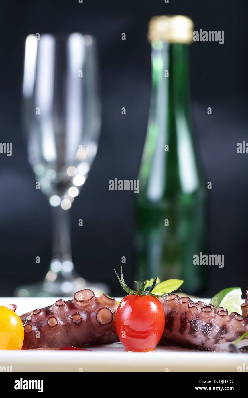 Close up Steam Octopus on the white dish Stock Photo - Alamy