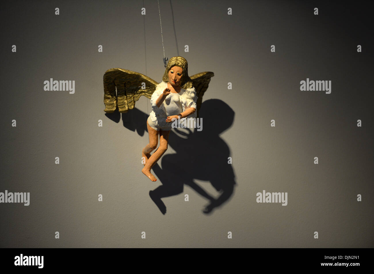 Dresden, Germay. 29th Nov, 2013. An 'angel' by artist Mario Lerch is ...