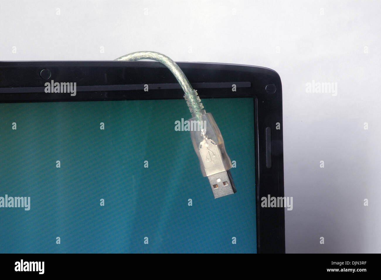 Illustration - an illustrated picture shows an USB cable that hangs ...
