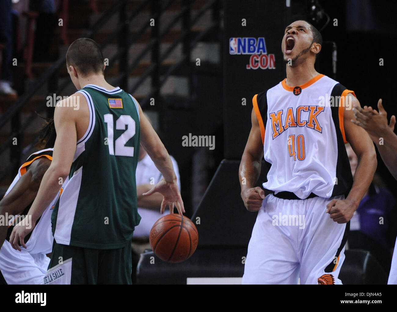 McClymond's Frank Otis, #40, reacts after getting the basket and the ...