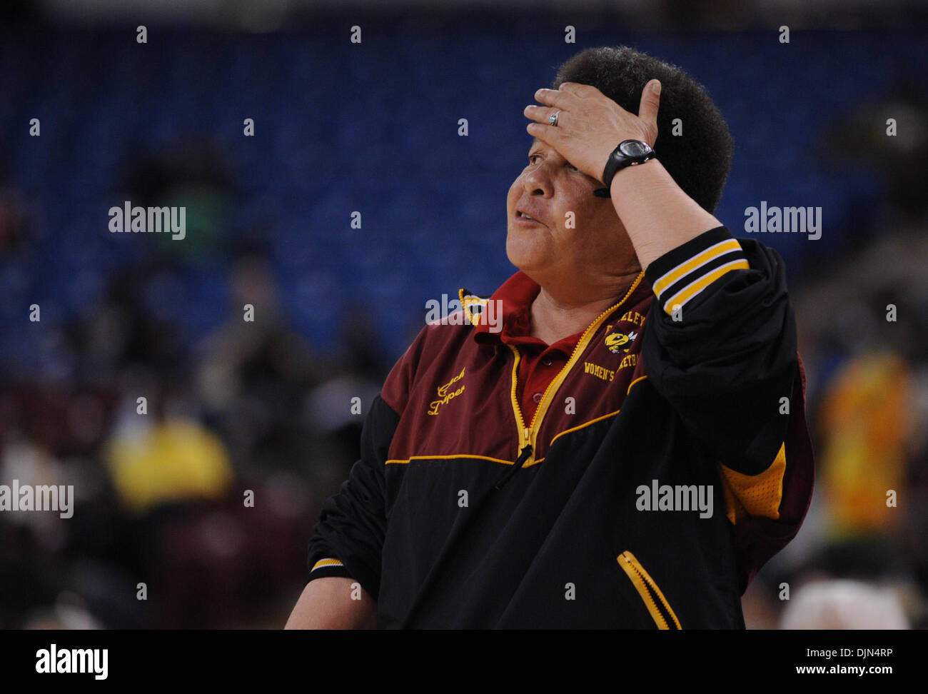Berkeley head coach Cheryl Draper wipes her forehead as her team falls ...