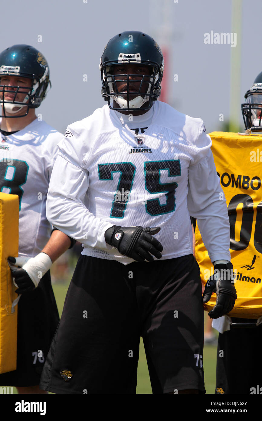 Rookie Eugene Monroe, a first round draft pick, runs through a drill during the Jacksonville ...