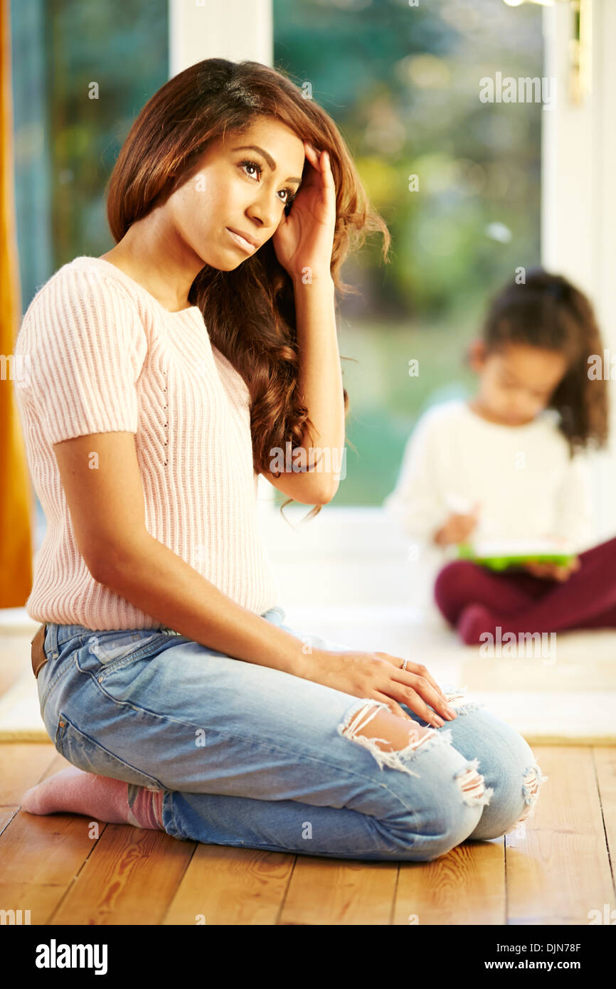Stressed mother with child Stock Photo - Alamy
