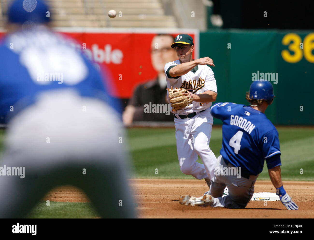 Oakland Athletics second baseman Mark Ellis (14) throws over Kansas ...